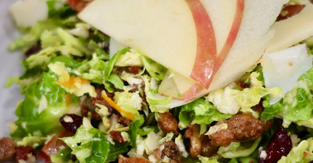 Shredded Brussels Sprouts Salad W/ Candied Walnuts & Orange Vinaigrette